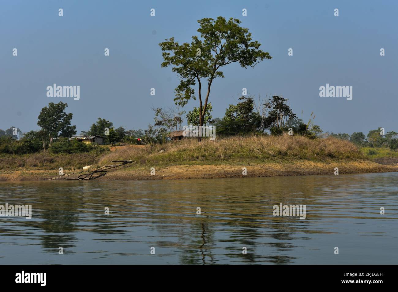 A small lake island in Dumboor . With clear water and reflection of ...