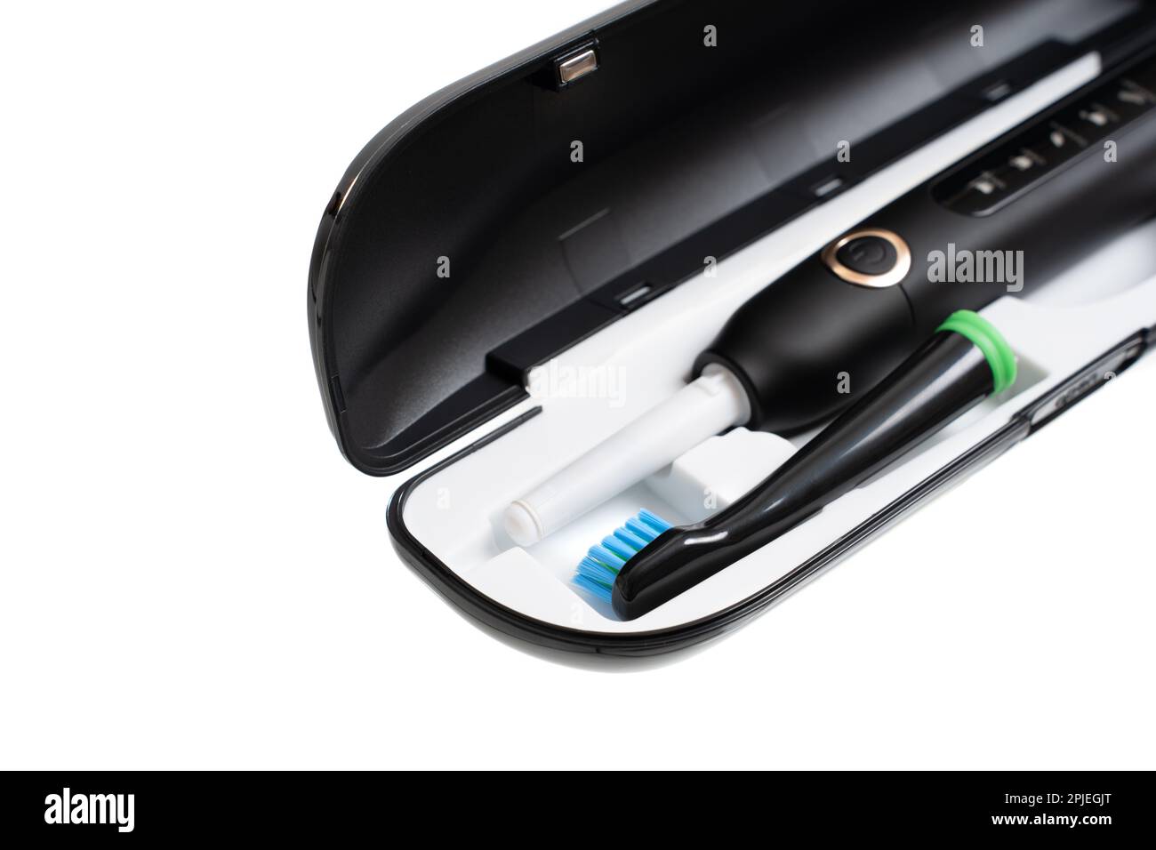 Close-up crop view of a black electric toothbrush with a detached brush ...