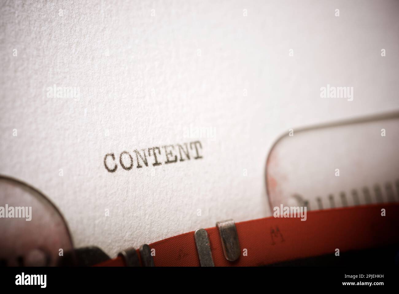 Content word written with a typewriter Stock Photo - Alamy