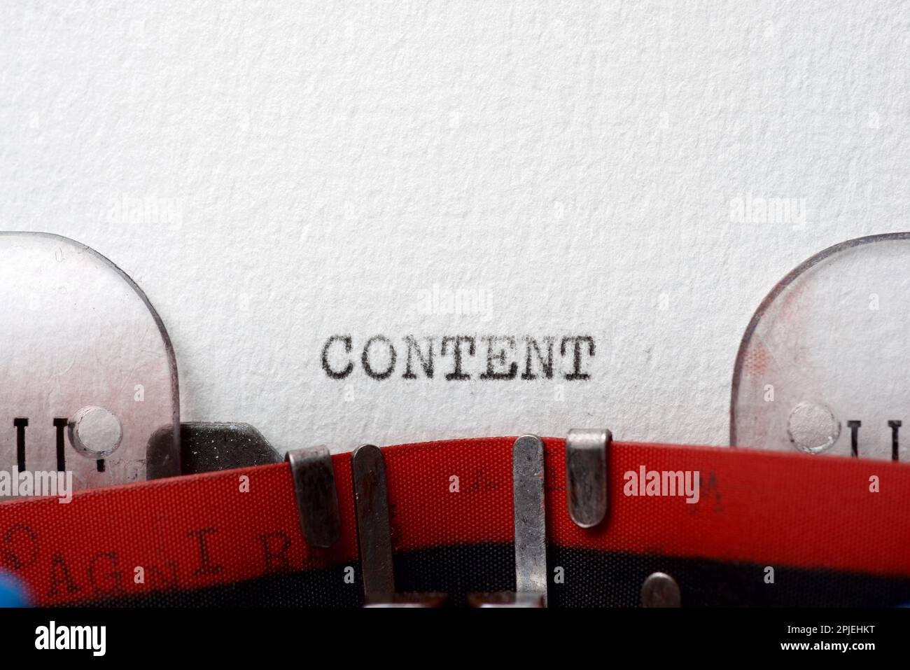 Content word written with a typewriter Stock Photo - Alamy