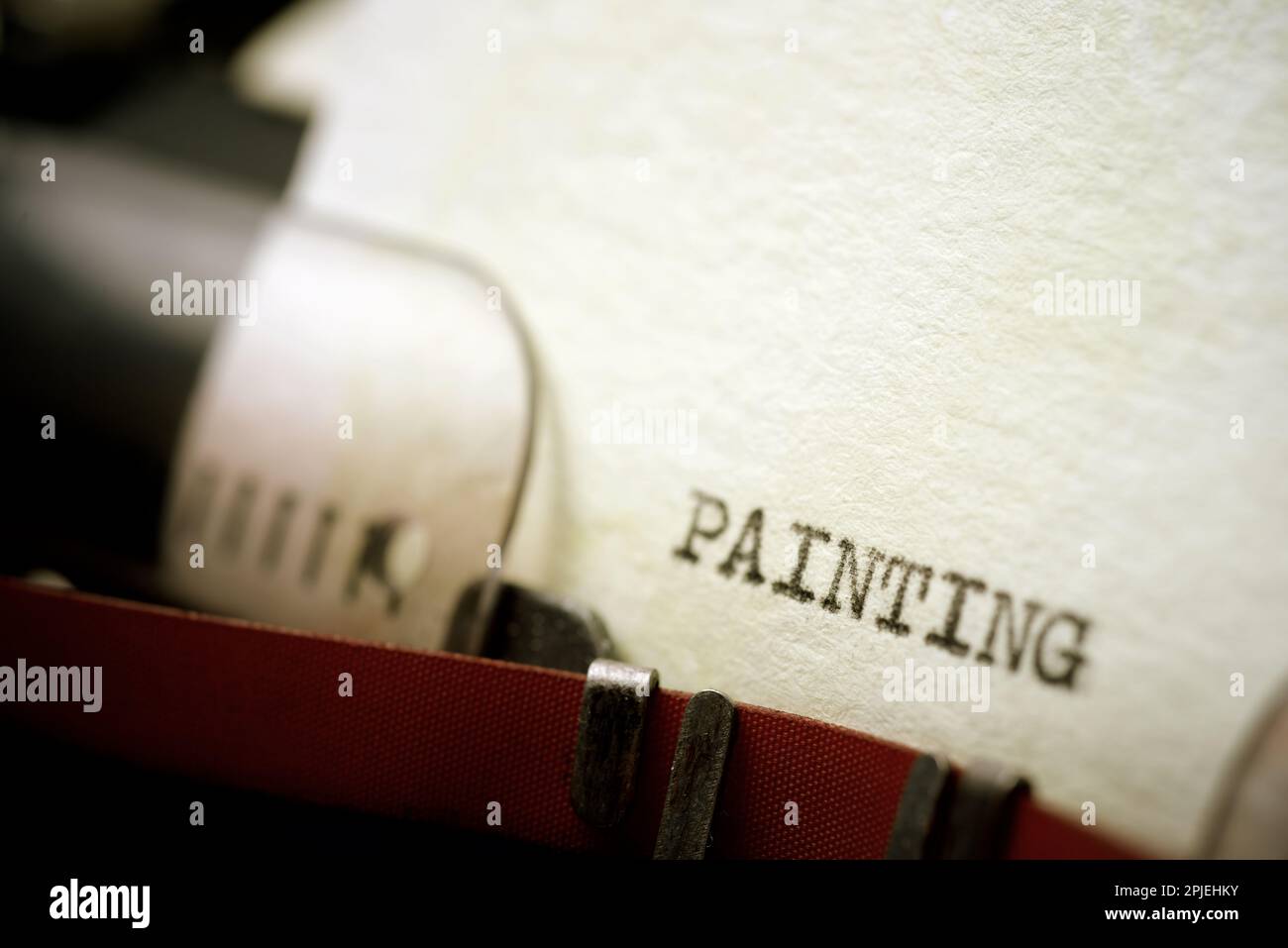 Painting word written with a typewriter Stock Photo - Alamy