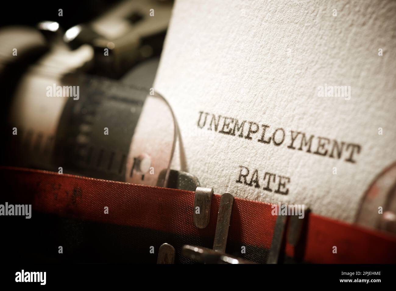Unemployment rate text written with a typewriter Stock Photo - Alamy