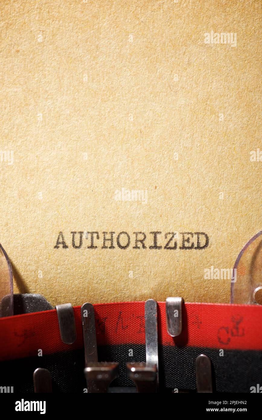 Authorized word written with a typewriter Stock Photo - Alamy