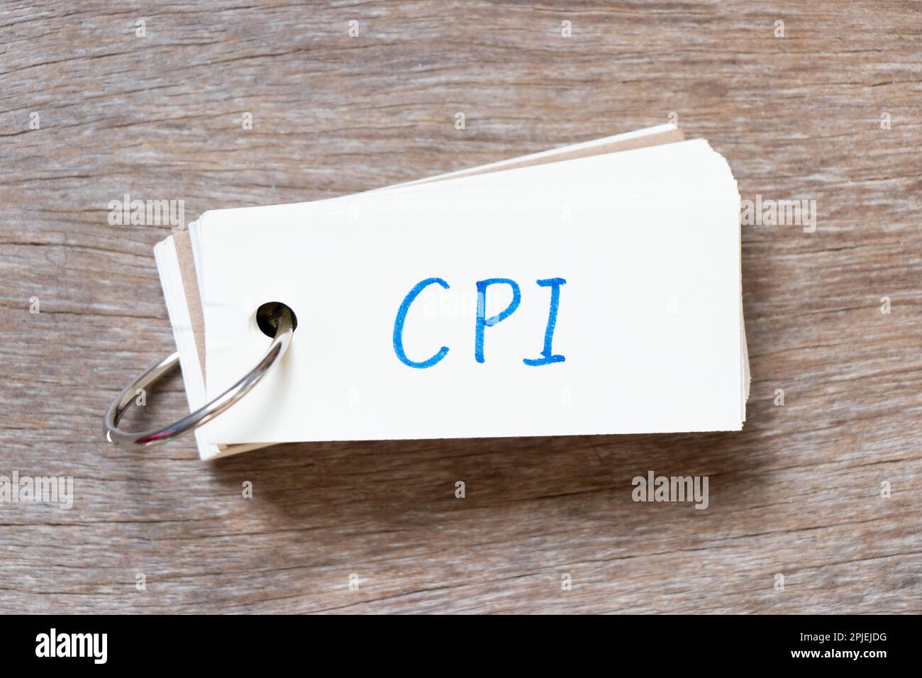 Flash card with handwriting in word CPI (abbreviation of Consumer Price ...