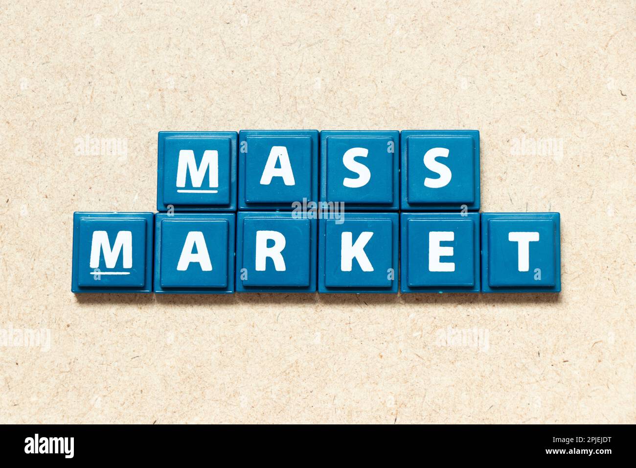 Tile alphabet letter in word mass market on wood background Stock Photo ...