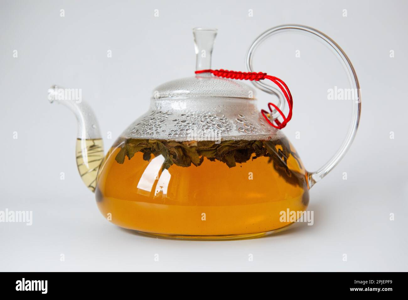 Teapot glass with tea isolated on white background with clipping path ...