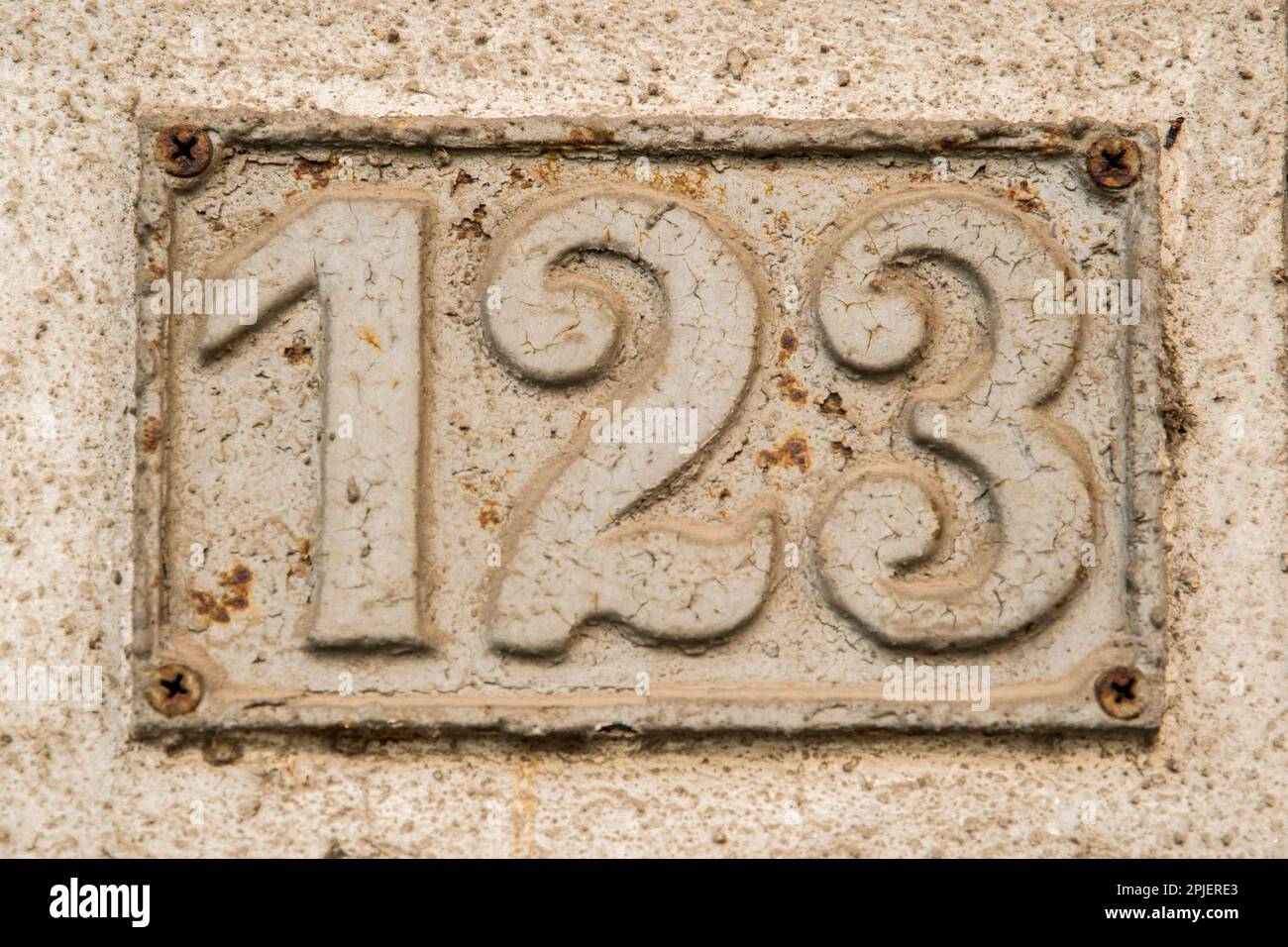 Old retro weathered cast iron plate with number 123 Stock Photo - Alamy