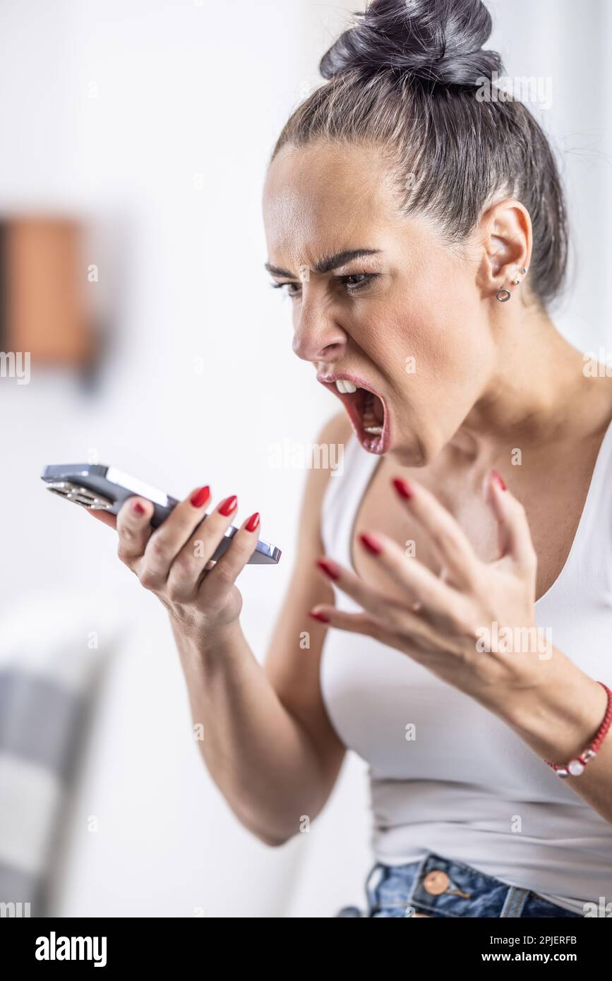 Angry woman shouting hi-res stock photography and images - Alamy