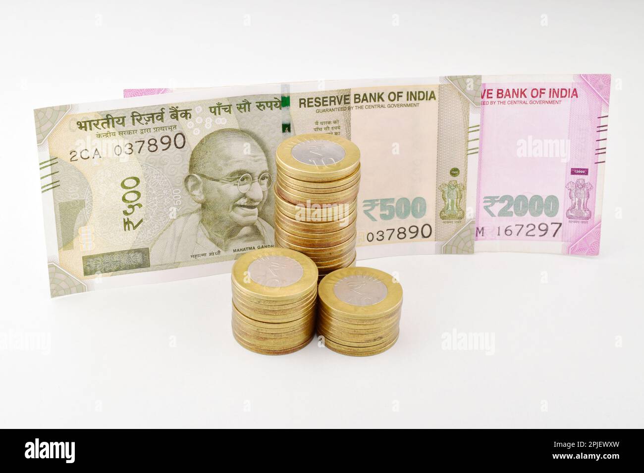 Indian currency note with coins isolated on white background Stock ...