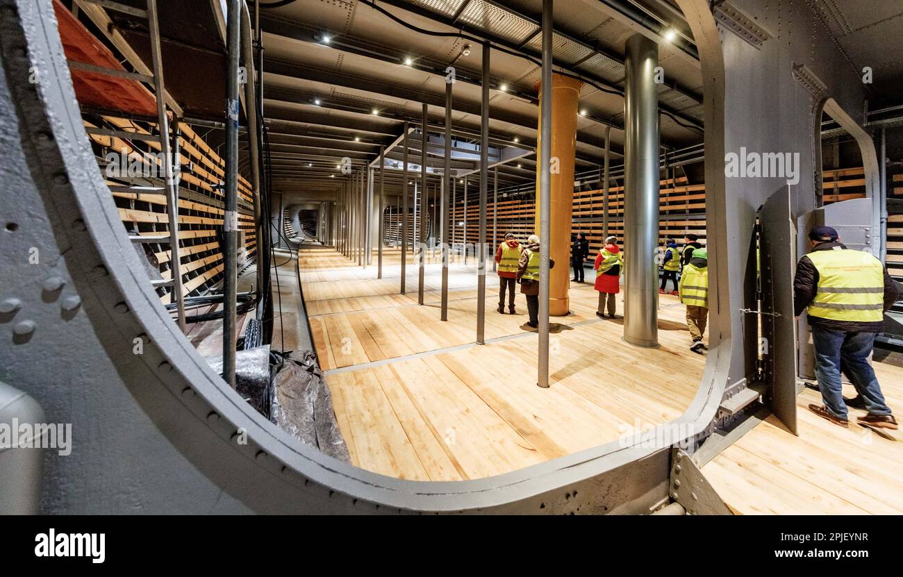 Hamburg, Germany. 02nd Apr, 2023. Visitors go on a guided tour of a ...