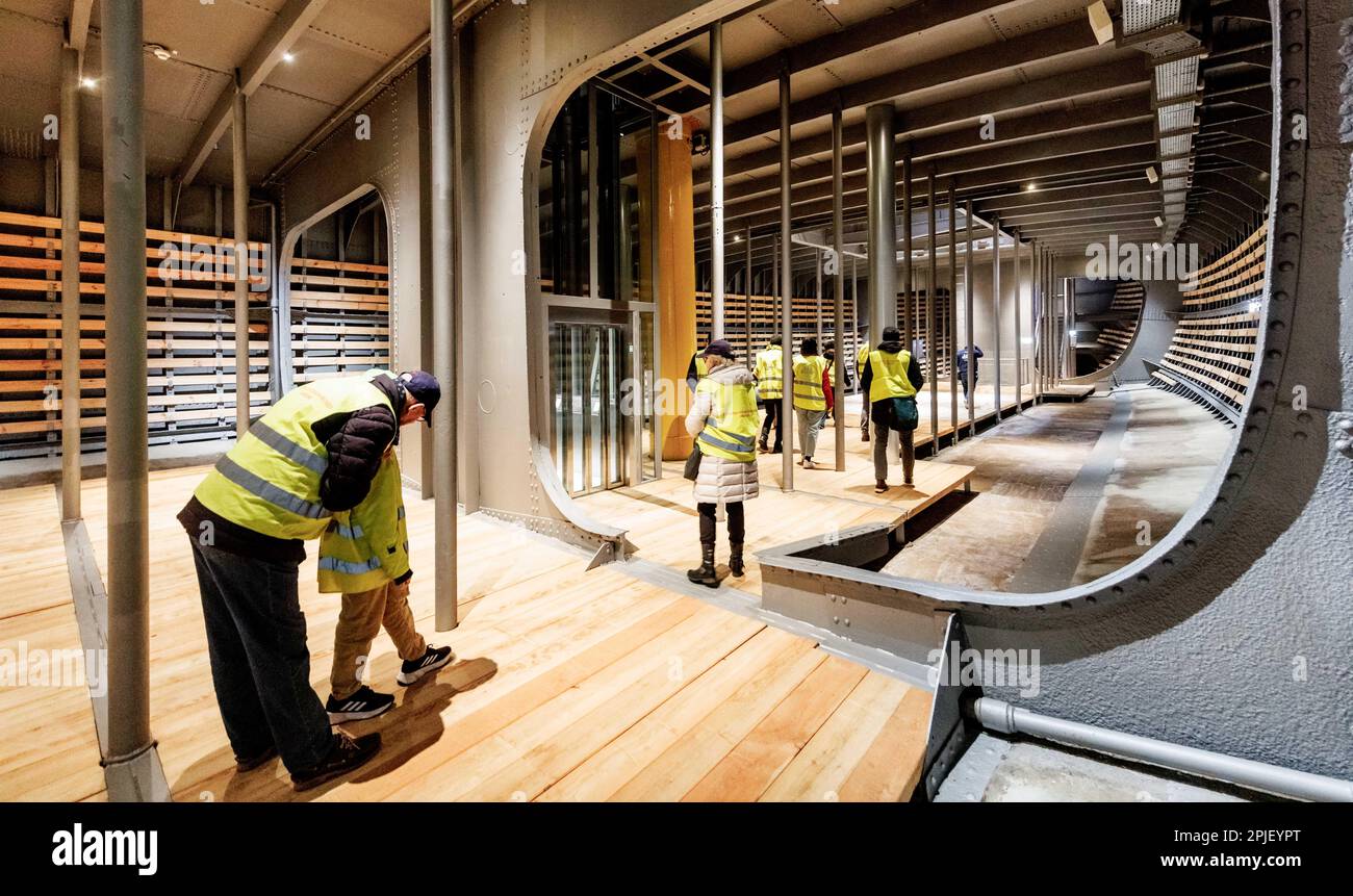 Hamburg, Germany. 02nd Apr, 2023. Visitors go on a guided tour of a ...