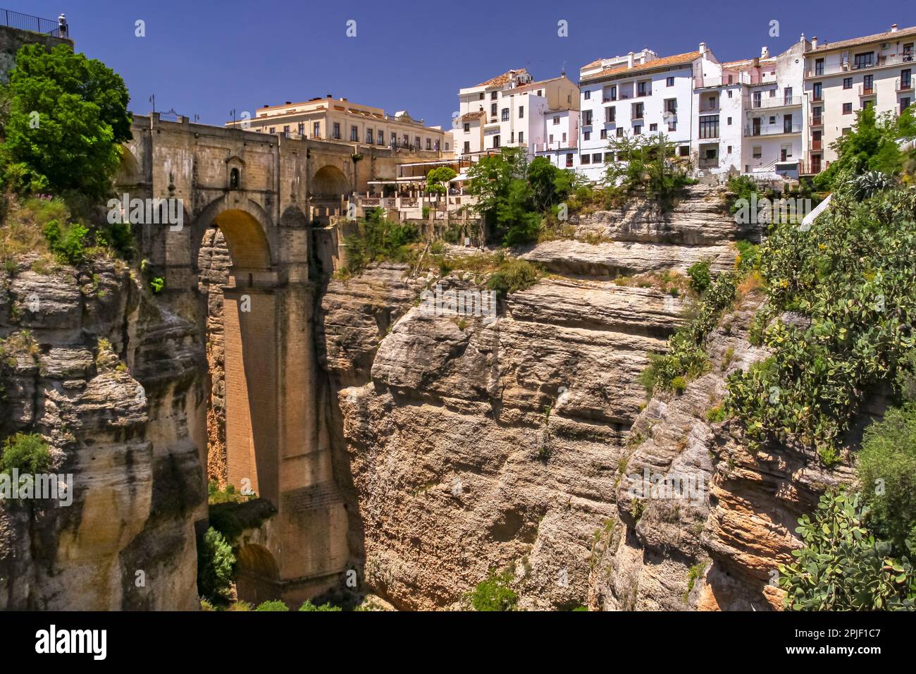 The spectacular Puente Nuevo bridge and gorge in the picturesque town ...