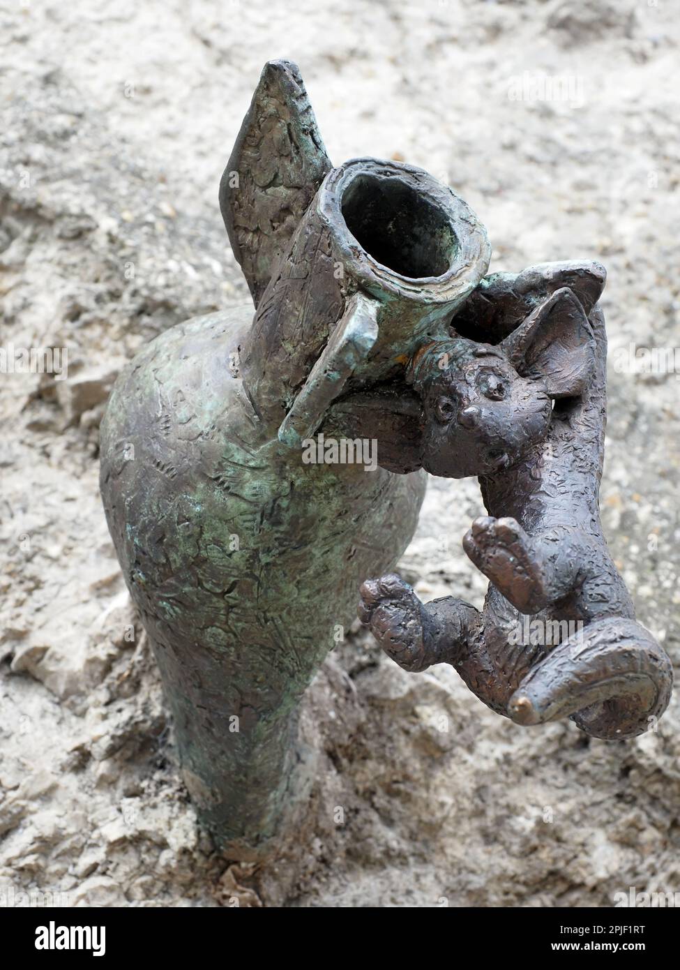 A mini-statue of Mihály Kolodko, Vuk munching on a bomb Stock Photo - Alamy