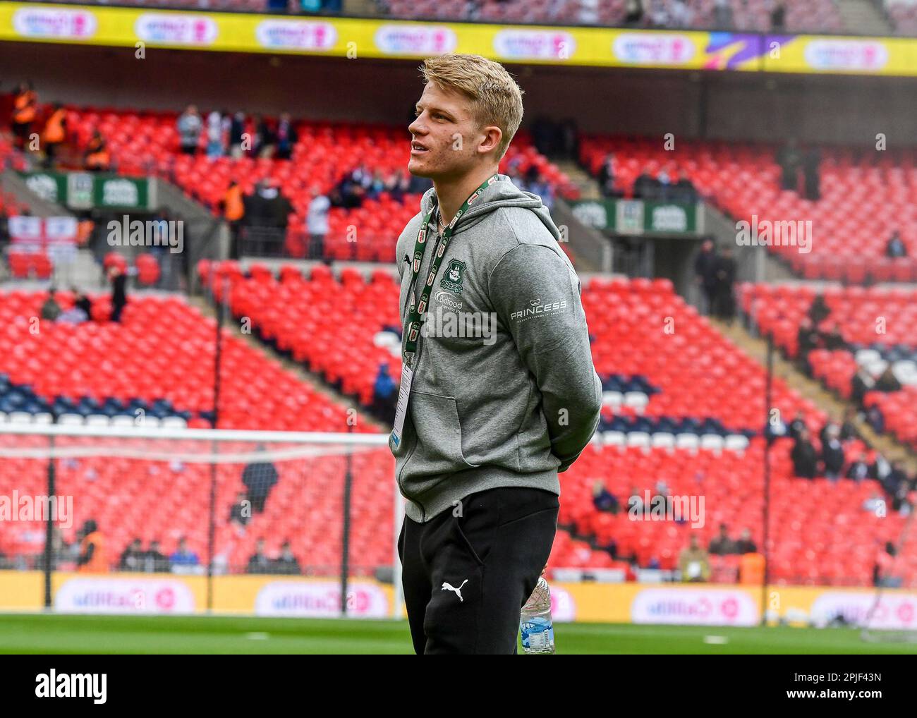 Saxon Earley #24 of Plymouth Argyle walks on and inspect the pitch ...