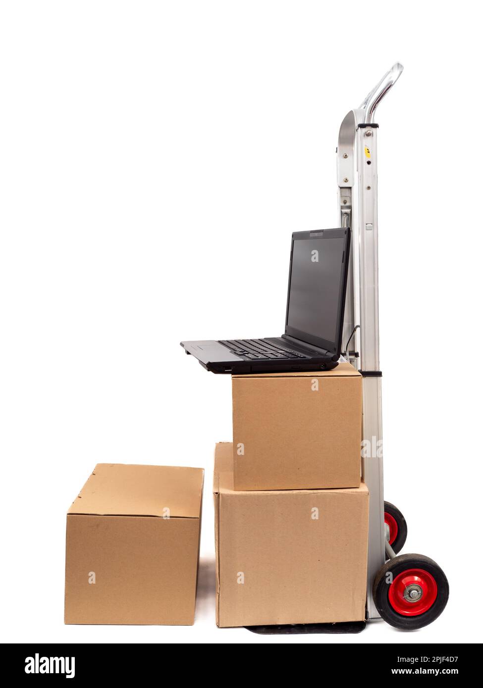 Cardboard boxes with a trolley and a laptop on a white background ...