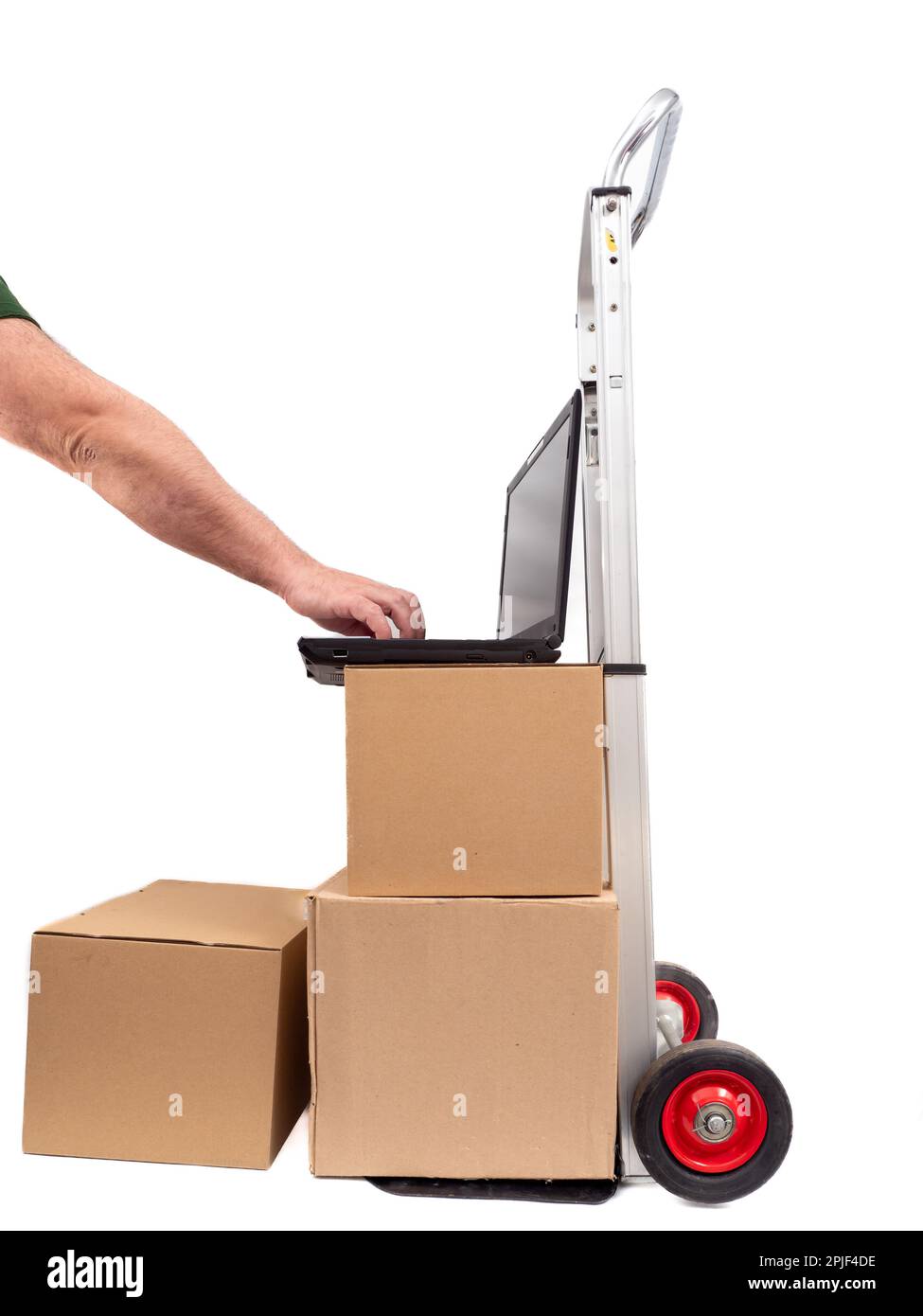Cardboard boxes with a trolley and a laptop on a white background ...