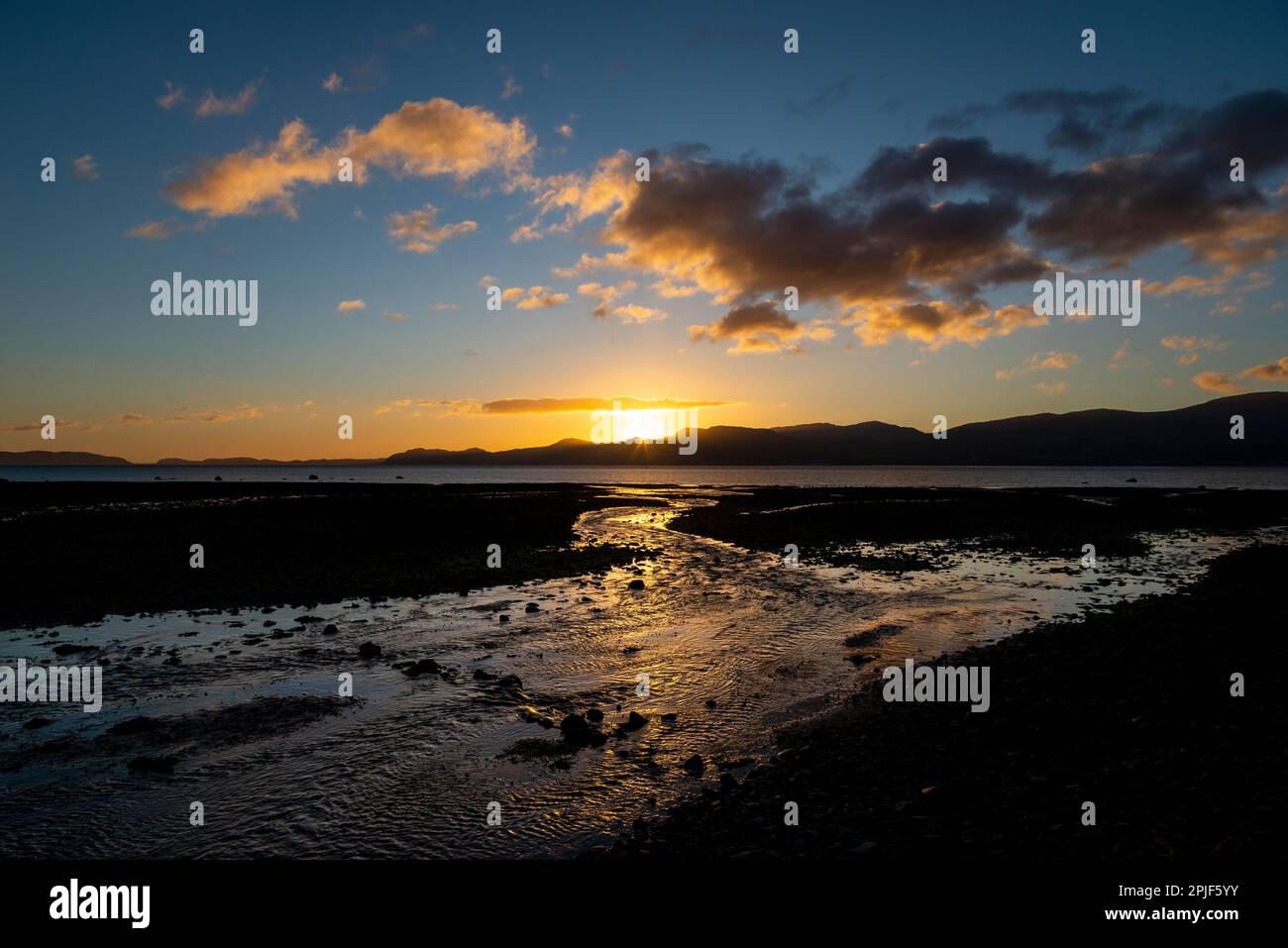 Beautiful sunrise on the Menai Strait near Beaumaris with the sun just ...