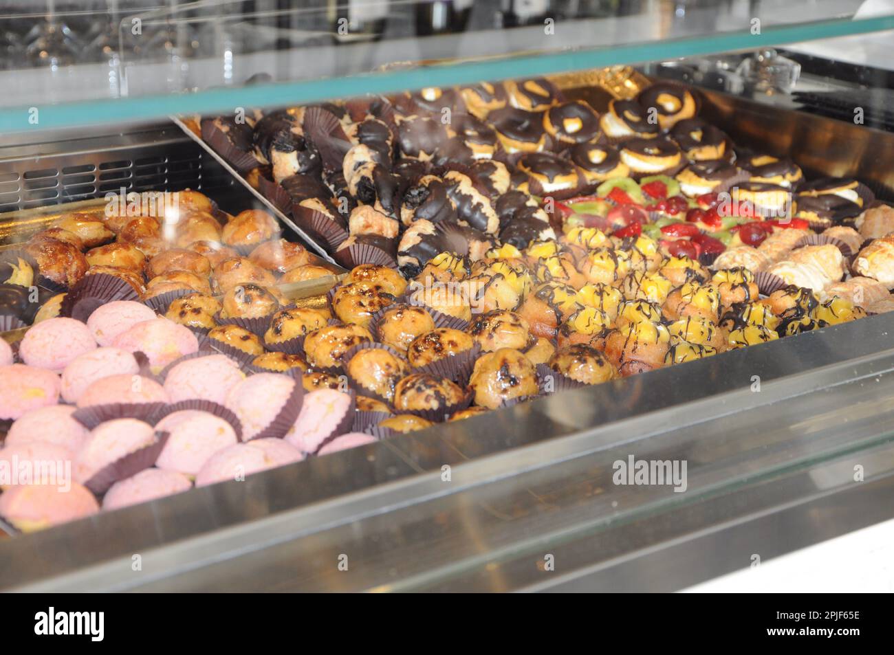 Patisserie display cakes artisanal bakery in italy bar Stock Photo - Alamy