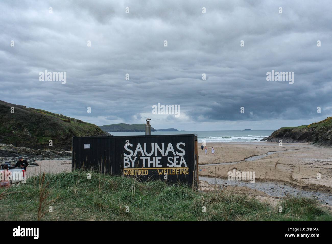 Wood fired sauna on the beach at Polzeath, Cornwall with the signage ...