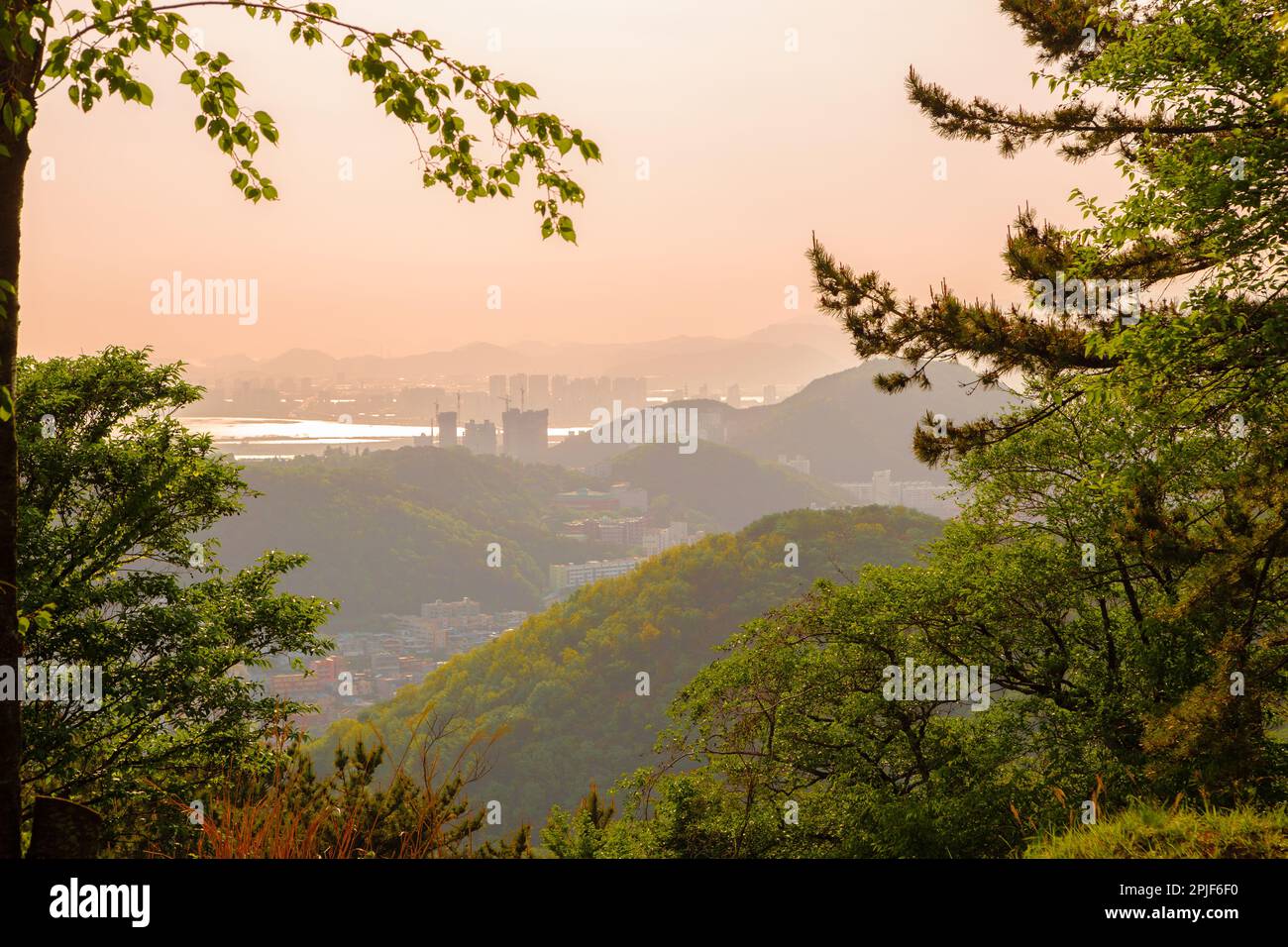 Sunset of Cheonmasan mountain and Busan city in Busan, Korea Stock ...