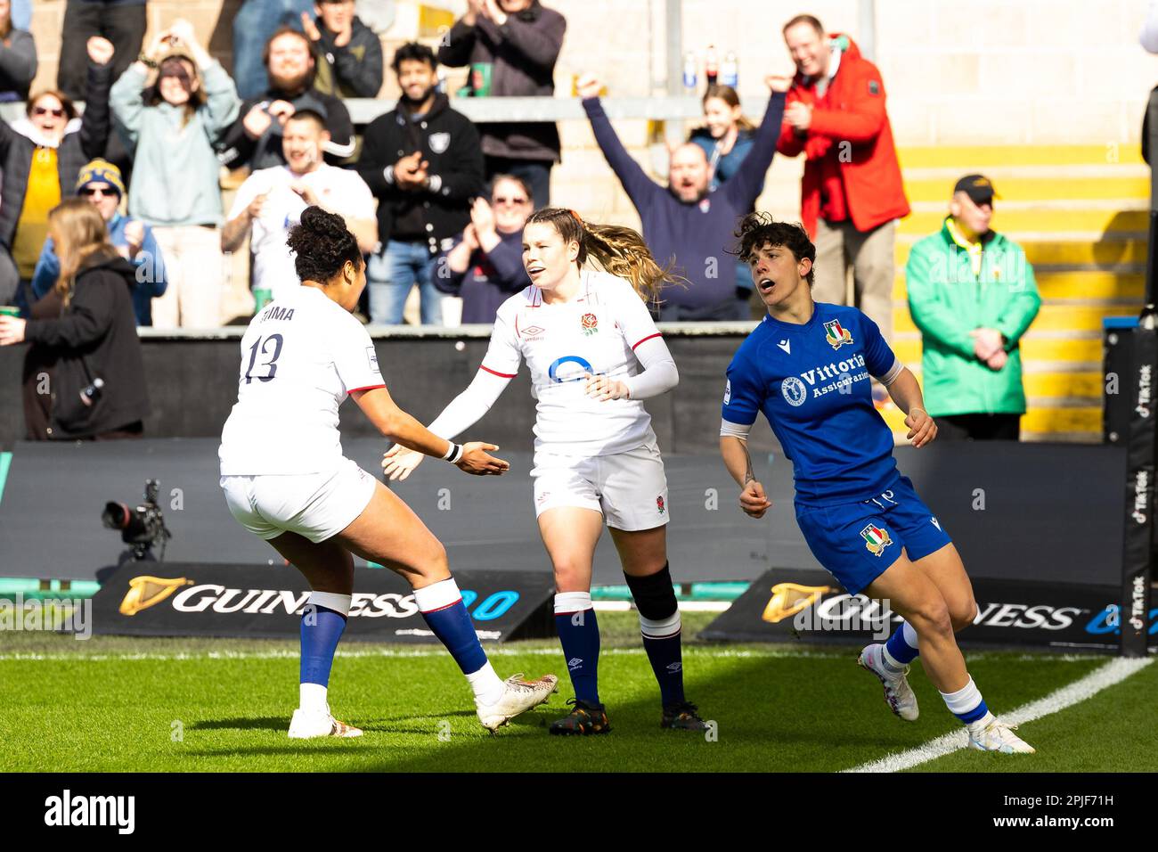 Holly Aitchison of England Women is congratulated by Lagi Tuima of ...