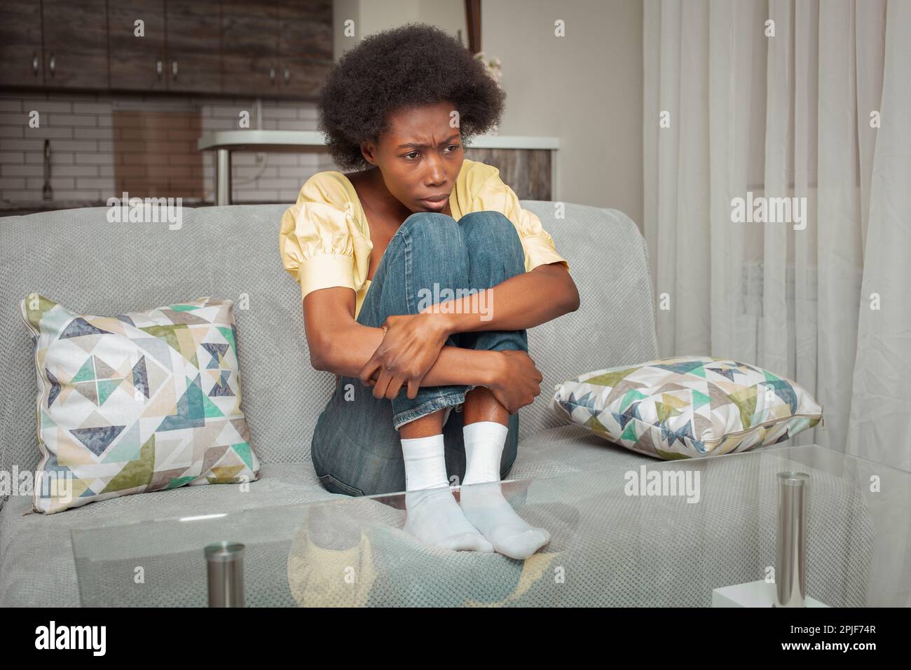 Tense african woman migraine work hi-res stock photography and images ...