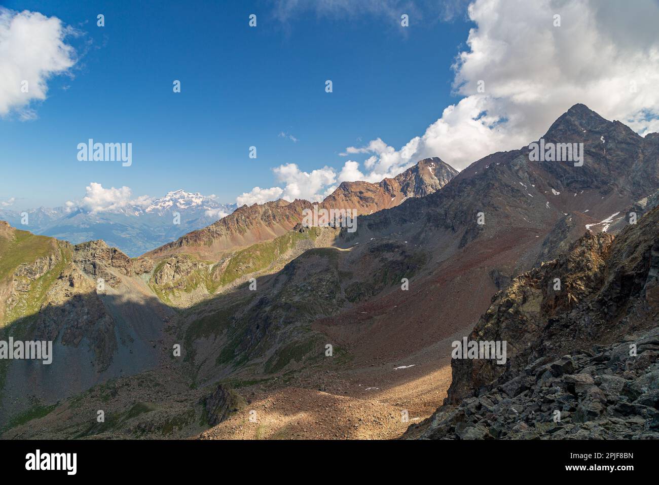 The beautiful valley in front of the Gran Paradiso in a summer day ...