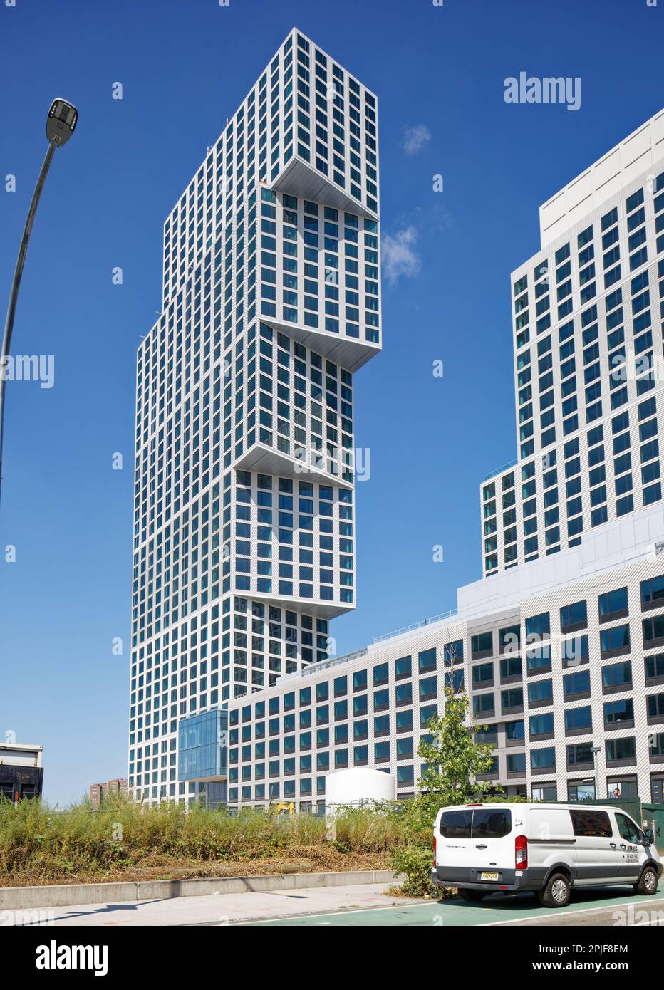 Eagle + West, full height: Interlocking cantilevers and setbacks in ...