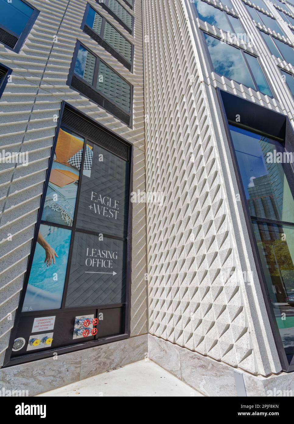 Eagle + West Detail: Textured concrete panels add to the complex's ...