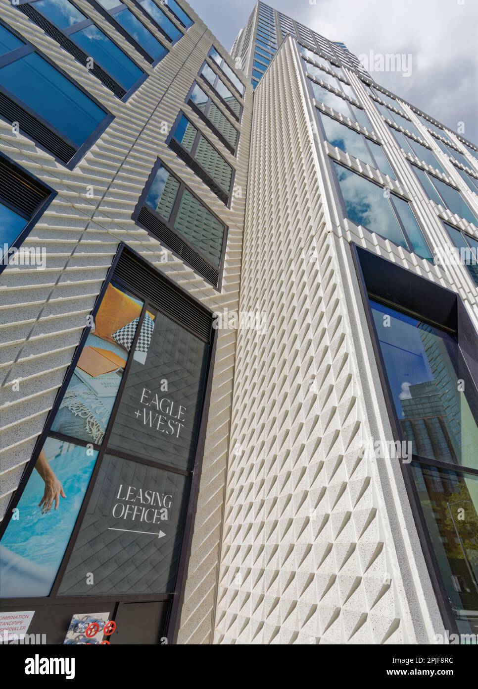 Eagle + West Detail: Textured concrete panels add to the complex's ...