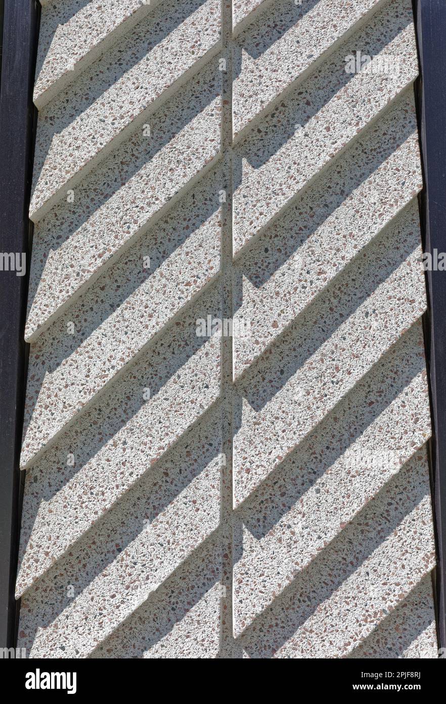 Eagle + West Detail: Textured concrete panels add to the complex's ...