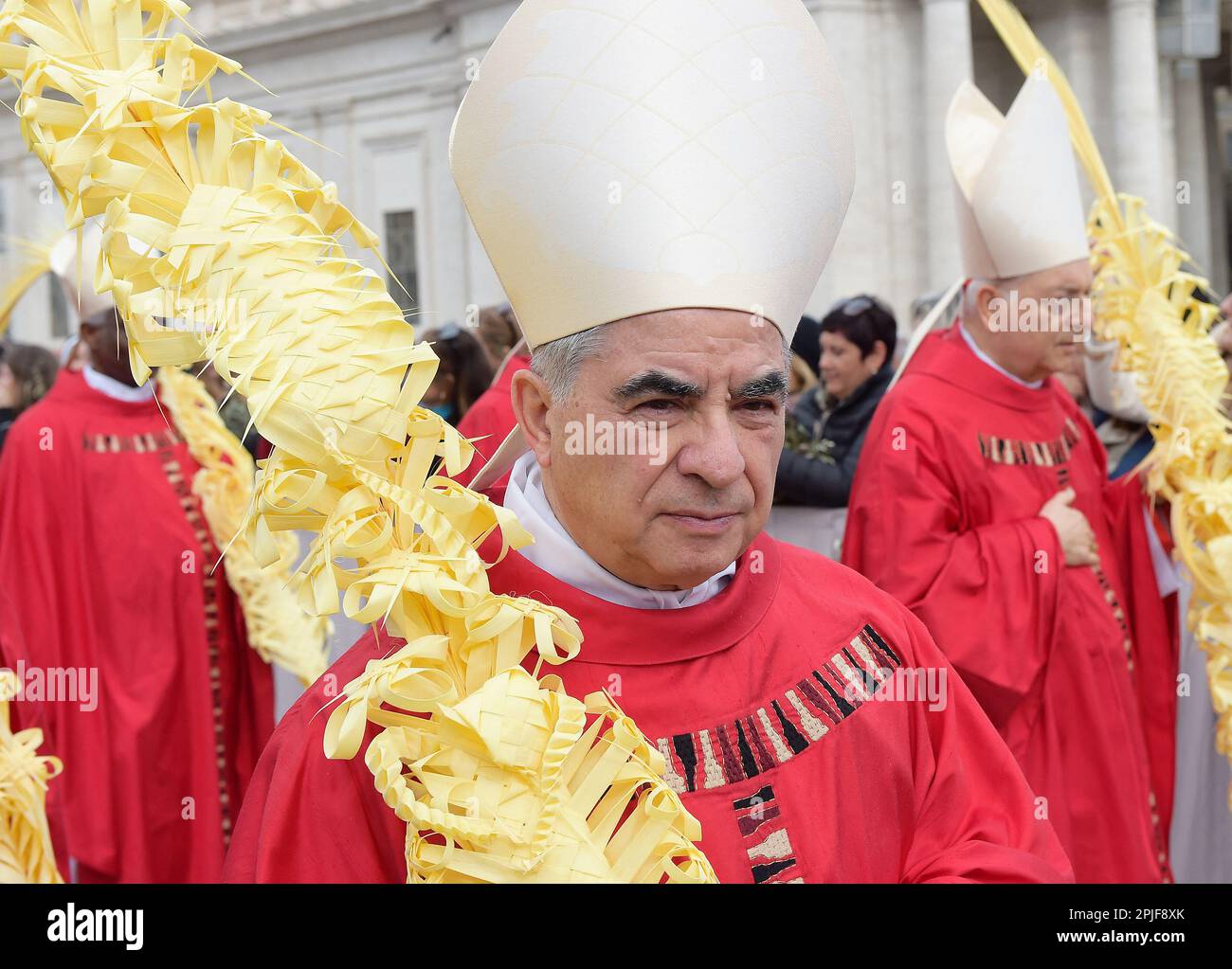 Cardinal Giovanni Angelo Becciu attends the Palm Sunday mass celebrated ...