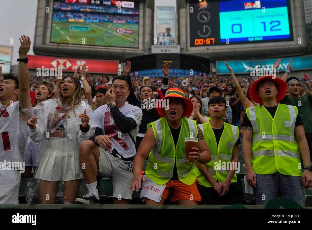 Spectators cheer as they watch the Hong Kong Sevens rugby tournament in ...