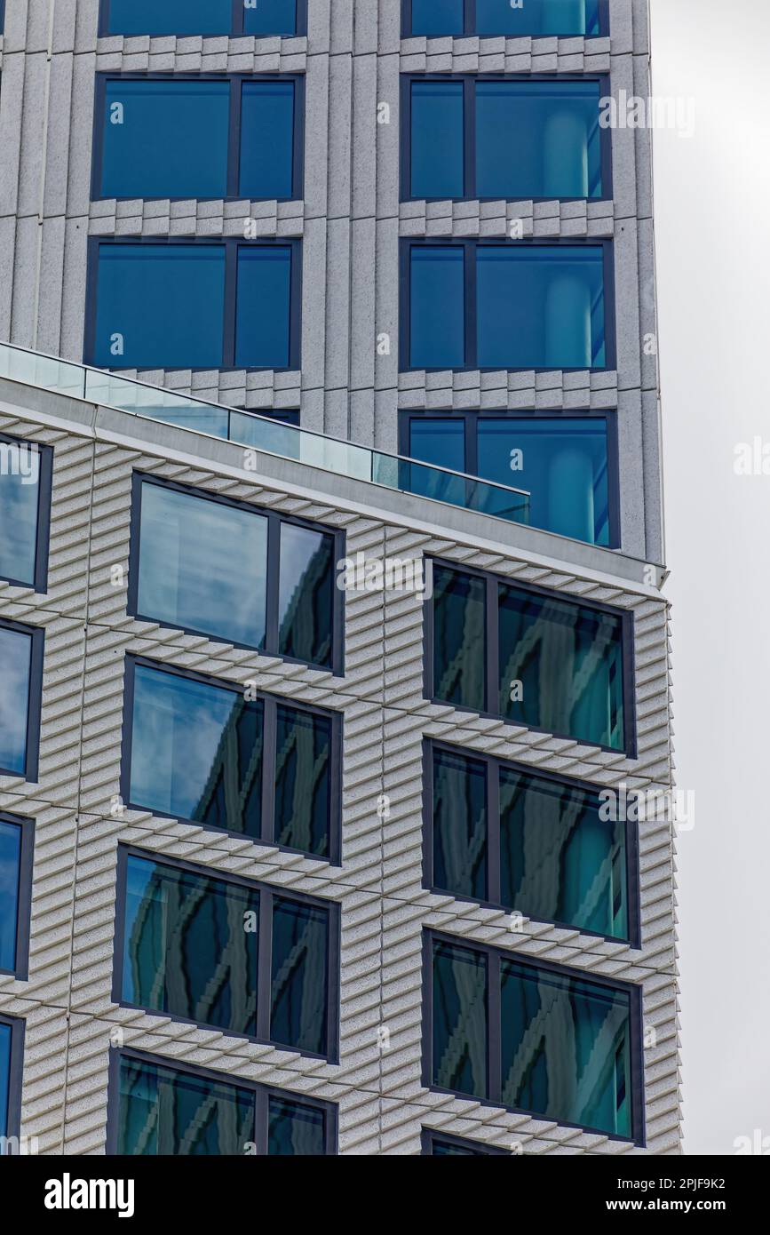 Eagle + West: Interlocking cantilevers and setbacks in white concrete ...