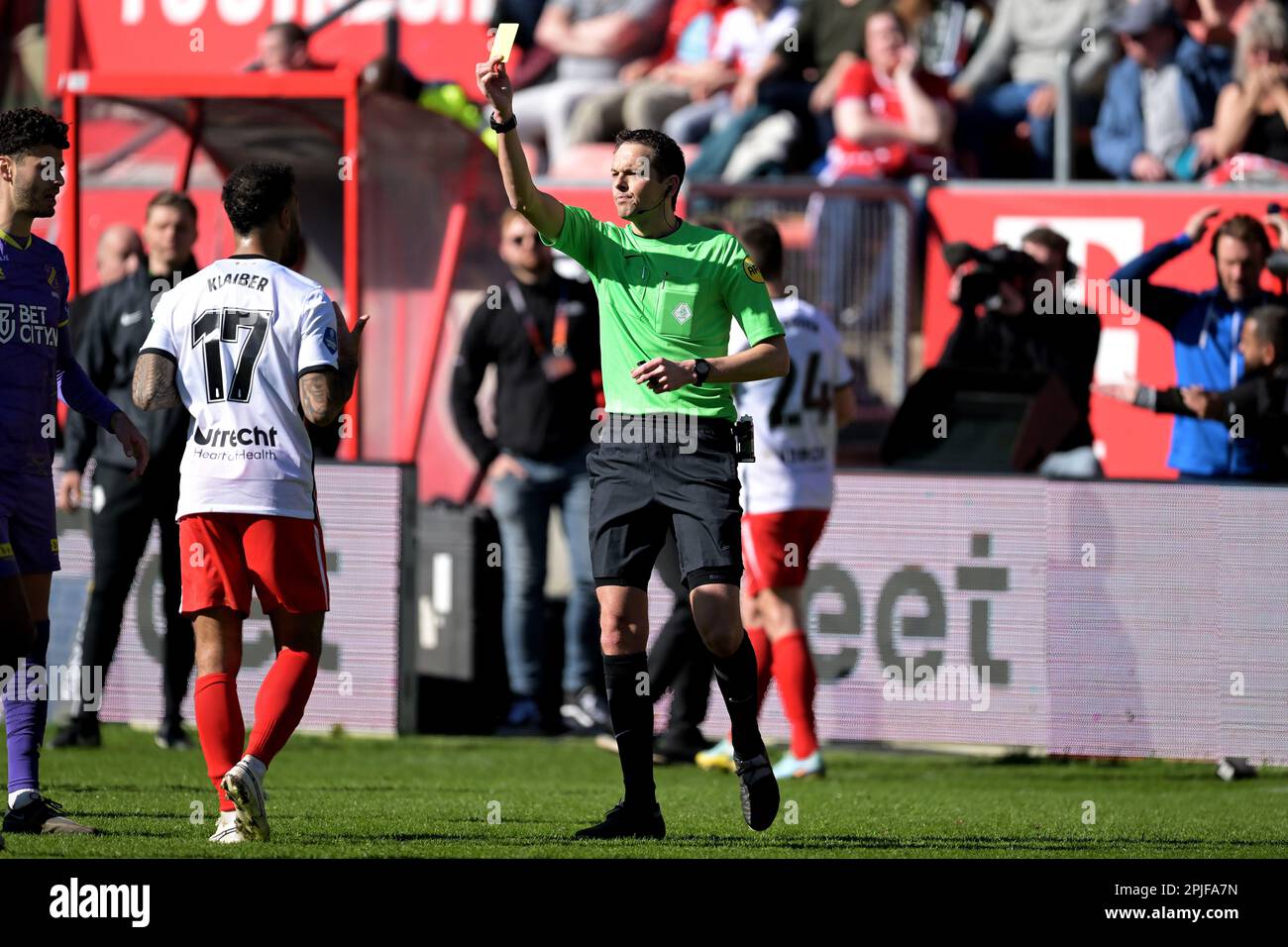 UTRECHT - Sean Klaiber of FC Utrecht is shown a yellow card by referee ...