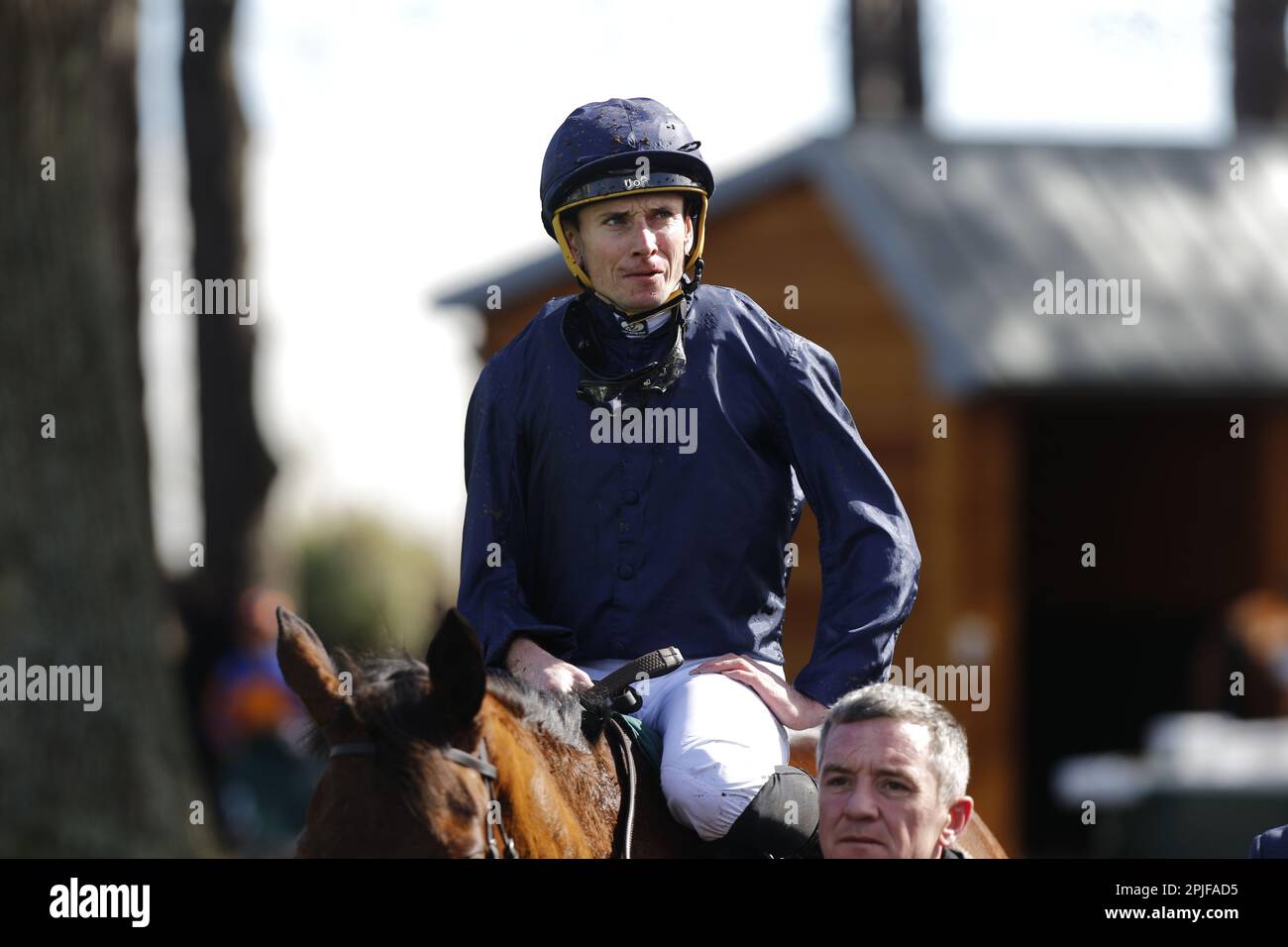 Jockey Ryan Moore enters the parade ring after winning the Ballylinch ...