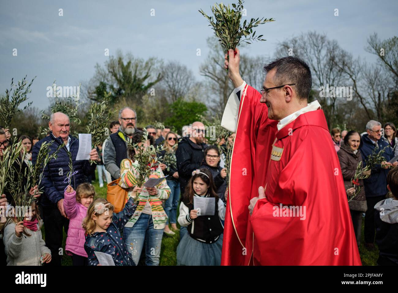 Castello Di Godego, Italy. 02nd Apr, 2023. A priest is seen blessing people during the ...