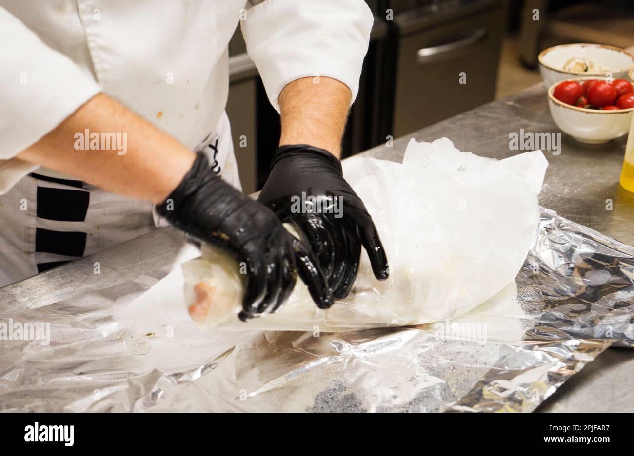 Cook processing meat burner in hi-res stock photography and images - Alamy