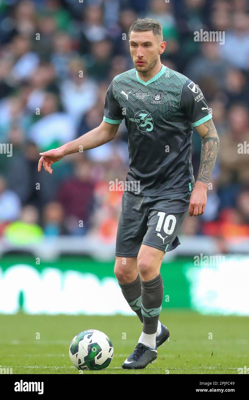 Danny Mayor #10 of Plymouth Argyle in action during the Papa John's ...