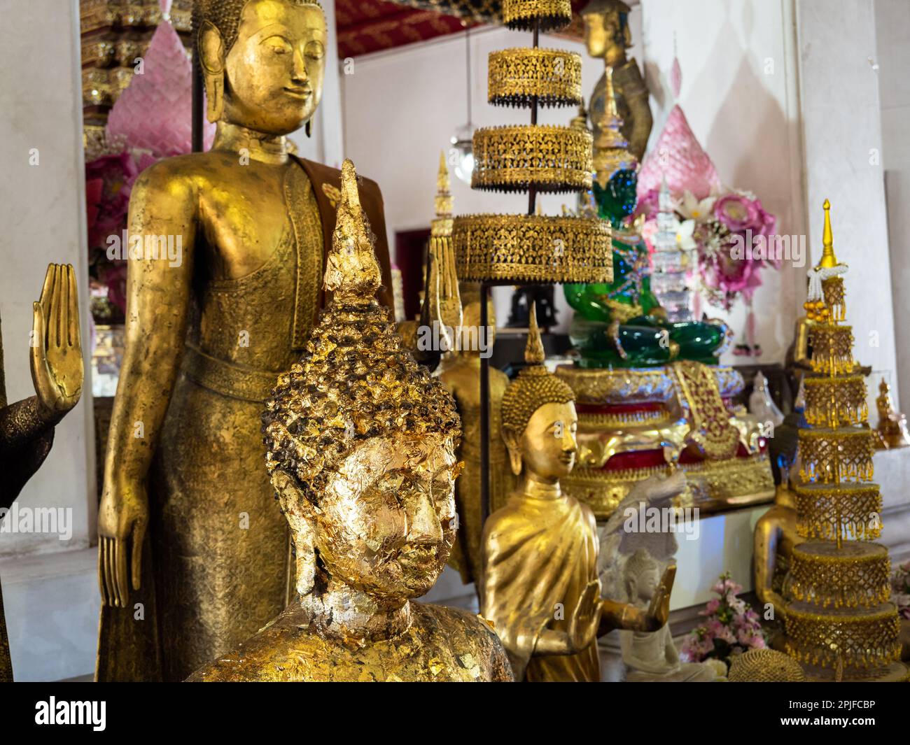 Experience the divine beauty of the golden Buddha statues, illuminating ...