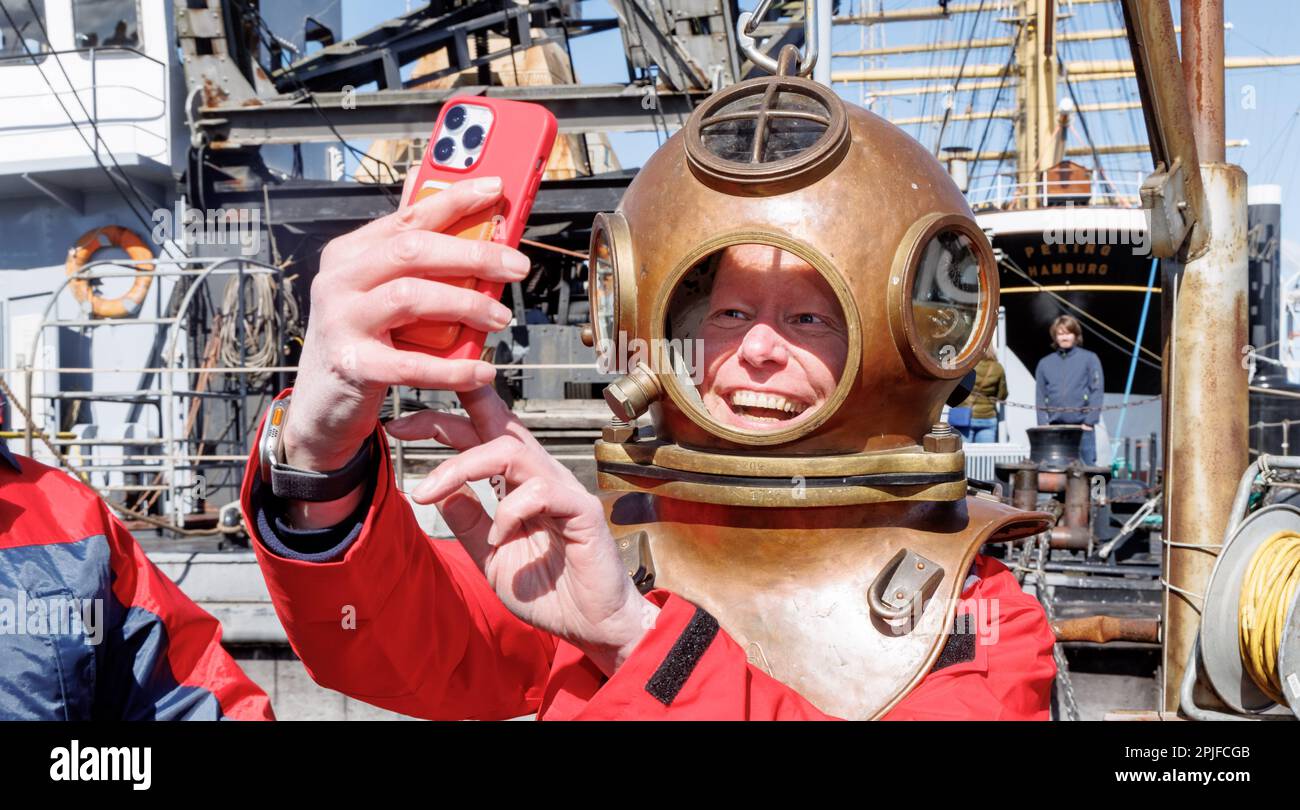 Hamburg, Germany. 02nd Apr, 2023. A visitor takes a selfie at the ...