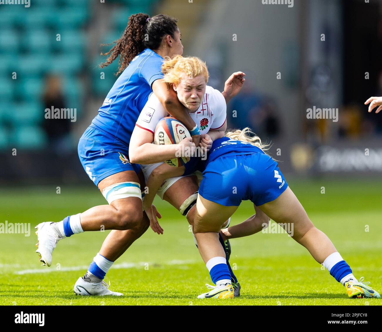 Delaney Burns, making her debut for England Women, is double-tackled ...
