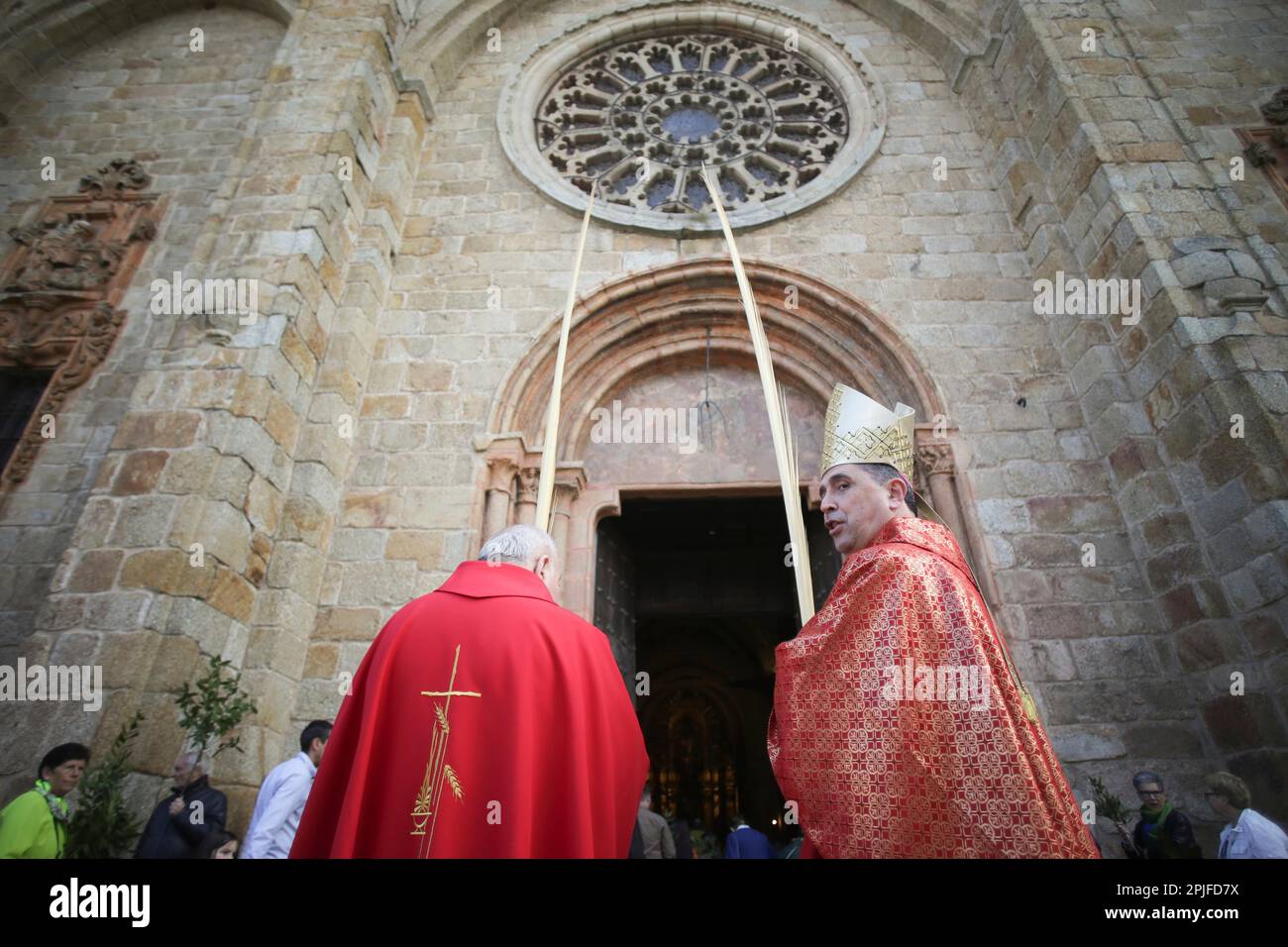 Two priests enter the Cathedral Basilica of the Assumption for the ...