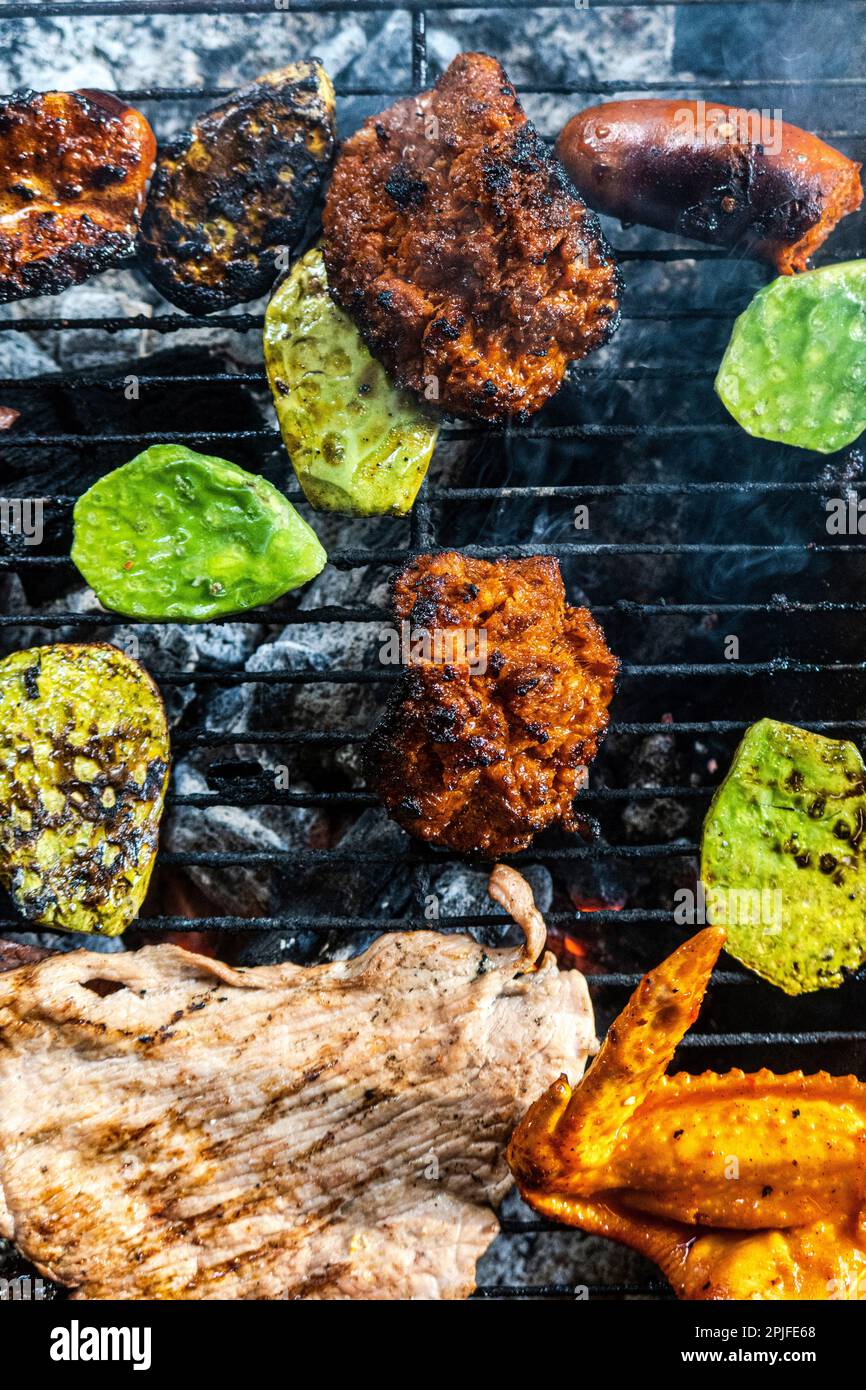 A Grilled nopales, chicken, sausage and grilled beef Stock Photo - Alamy