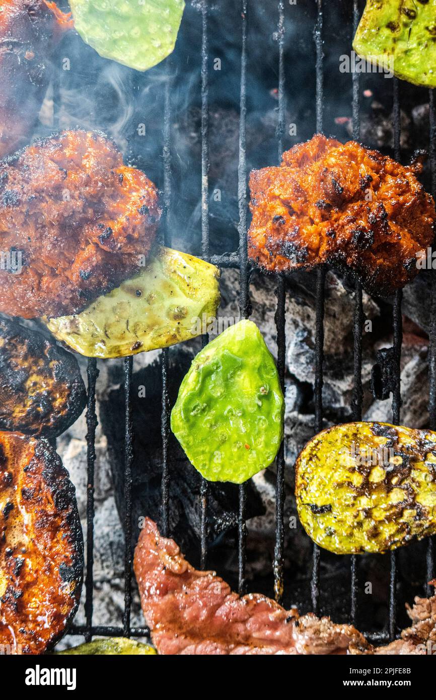 A Grilled nopales, chicken, sausage and grilled beef Stock Photo - Alamy