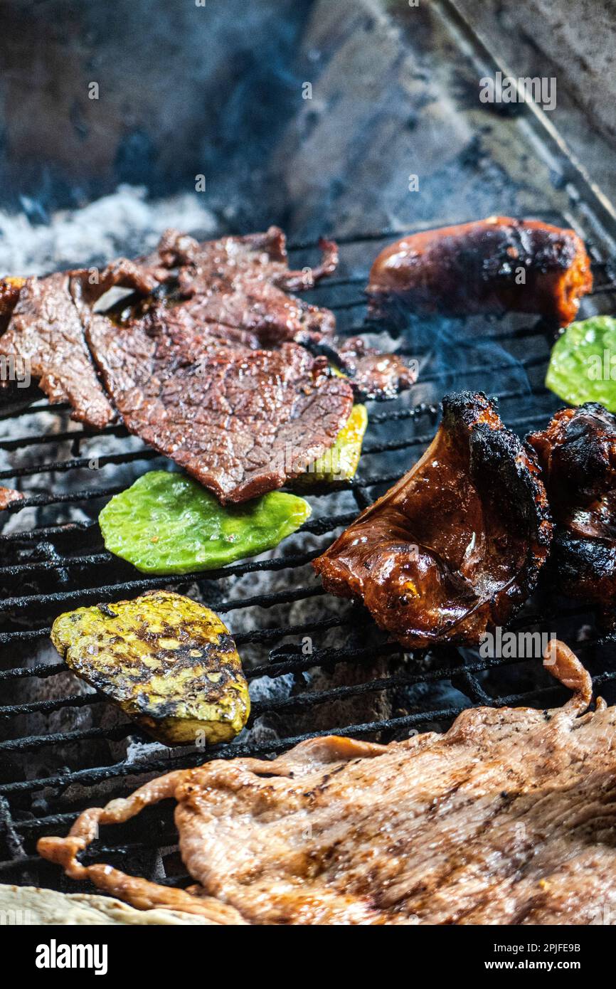 A Grilled nopales, chicken, sausage and grilled beef Stock Photo - Alamy