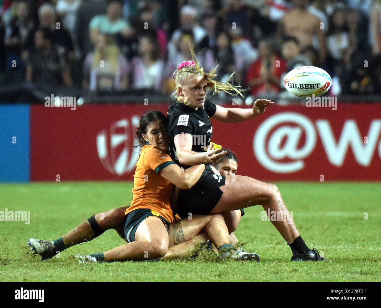 Hong Kong. 2nd Apr, 2023. Jorja Miller (top) of New Zealand competes ...