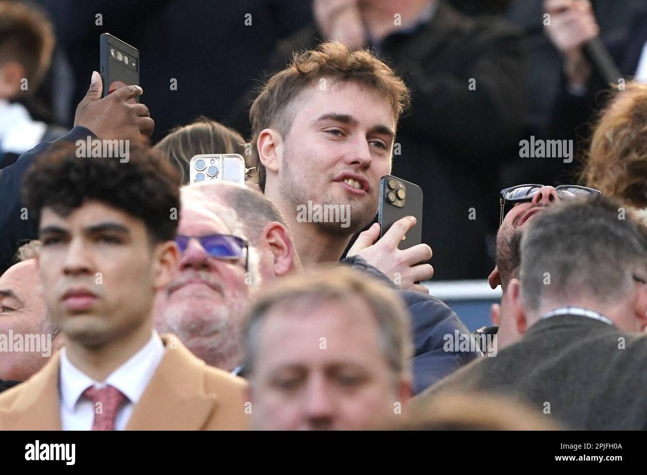Musician Sam Fender (centre) in the stands ahead of the Premier League ...