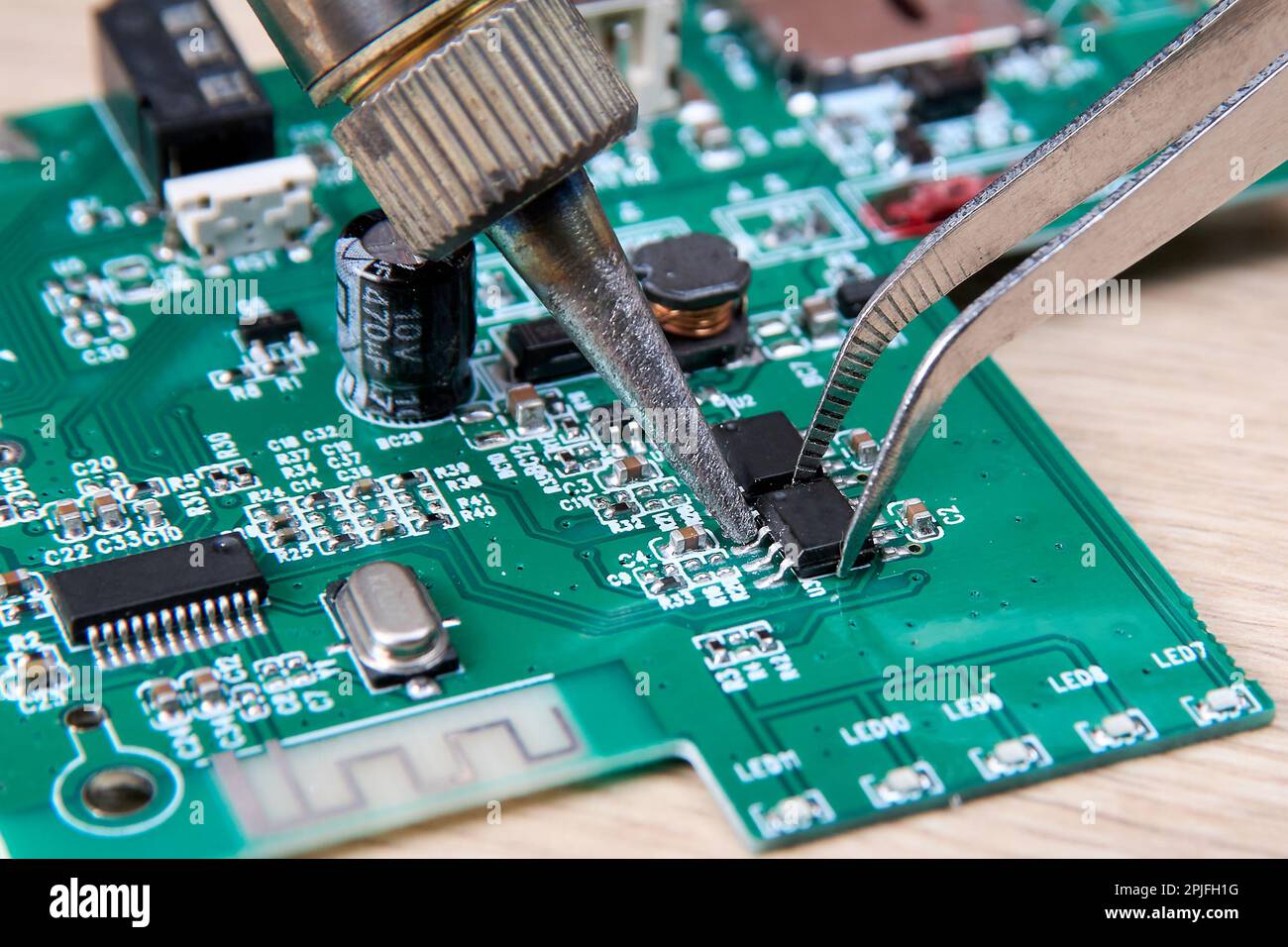 Replacing a damaged part in an electronic circuit board using a ...