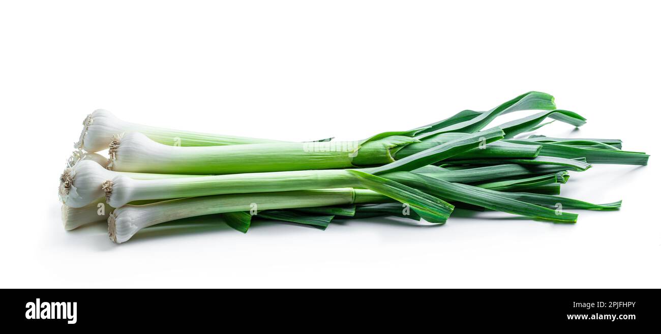 Bunch of homegrown leeks isolated on white background Stock Photo - Alamy